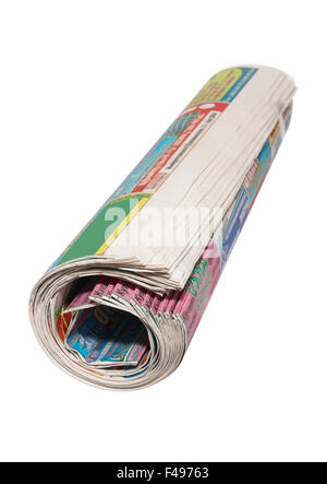 Rolled newspaper on white background Stock Photo - Alamy