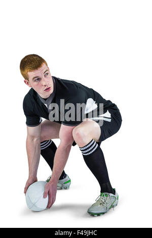 Rugby player about to throw a rugby ball Stock Photo - Alamy