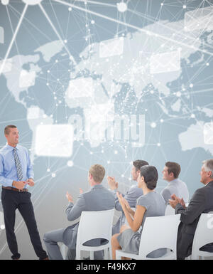 Composite image of business partners presenting sign Stock Photo - Alamy