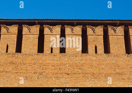 Embrasure in the defense wall of red bricks of ancient city Stock Photo ...