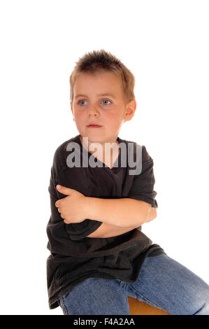 Cute little boy hugging himself on white background Stock Photo - Alamy