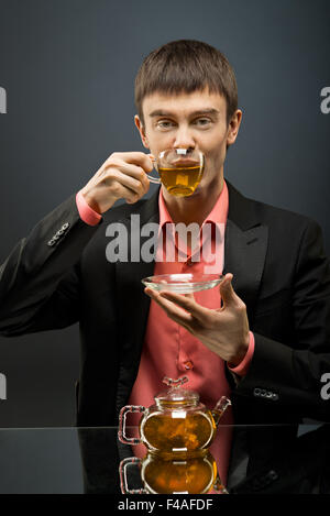 Close-up of a man drinking tea Stock Photo - Alamy