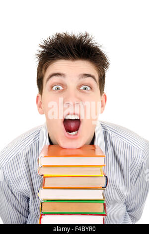 Stack books or textbooks and one opened book on wooden desk in room ...