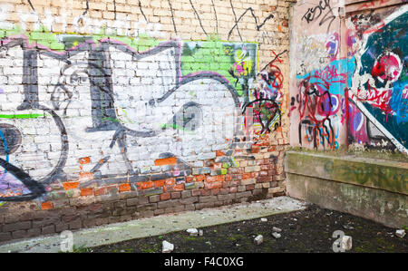 Inner city background with colorful graffiti Stock Photo - Alamy
