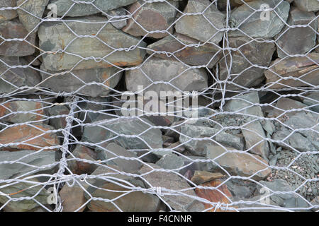 ROCK WALL supported with wire mesh Stock Photo - Alamy