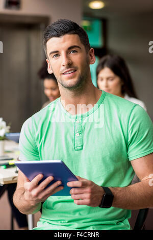 Student working on assignment with tablet Stock Photo - Alamy