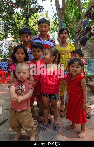 All family. Children posing. Sa Dec. Vietnam, Indochina, South East ...