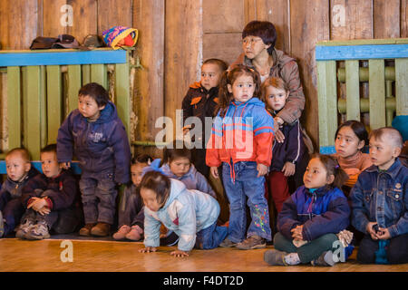 Russia, Chukotka, Chaplino Village, Chukchi boy performing traditional ...