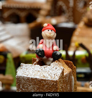 Marzipan Santa, in gingerbread village Stock Photo - Alamy