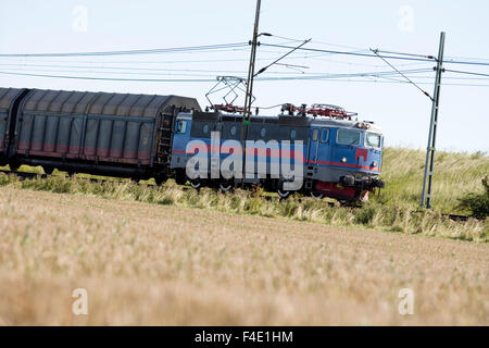 Goods train on the countryside, Skane, Sweden Stock Photo - Alamy