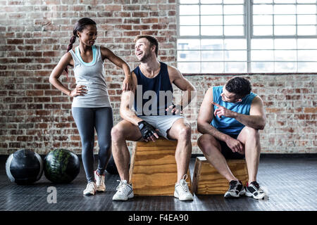 Fit smiling people posing together Stock Photo - Alamy