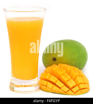 Sweet tasty yellow mango over wooden background Stock Photo - Alamy