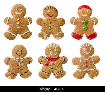 Set with decorated gingerbread men on white background. Delicious ...
