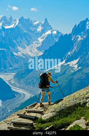 Hikers in the Aiguilles Rouges National Nature Reserve, view at the ...