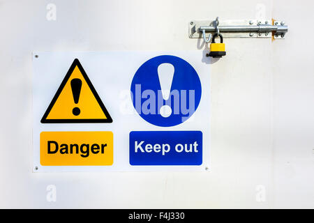 Sign warning of a dangerous building and to keep out. The building ...