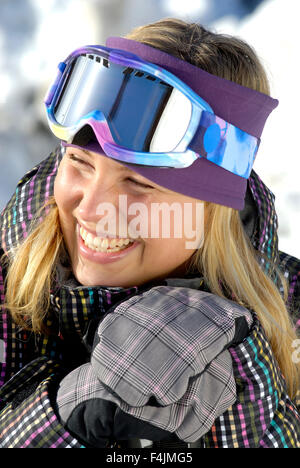 Young blonde woman wearing winter sweater over isolated background ...