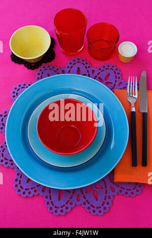 multi colored cutlery Stock Photo - Alamy