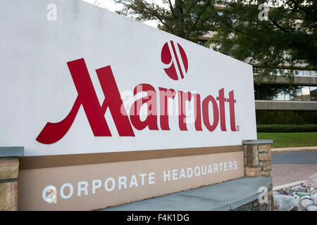 A logo sign outside of the headquarters of Marriott International, Inc ...