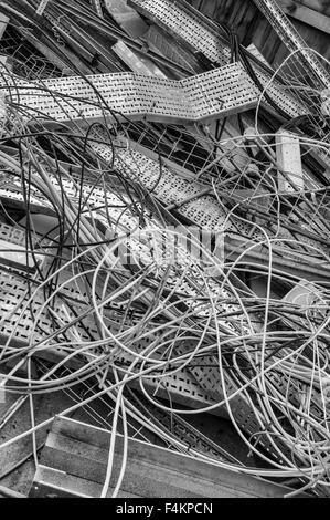 Scrap wire and metal trays Stock Photo - Alamy