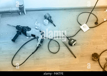 Place of electric socket repair process with drill Stock Photo - Alamy