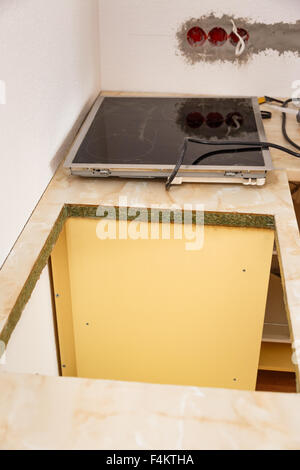 Installing new induction hob in modern kitchen Home Improvement Kitchen ...