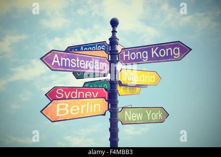 signboard with directions to Countries Stock Photo - Alamy