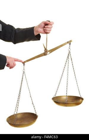 Scales of justice, weight of justice on hand, law Stock Photo - Alamy
