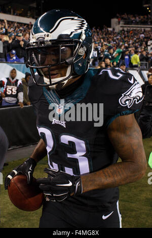 Philadelphia Eagles' Nolan Carroll (23) tackles a fan that ran onto the ...