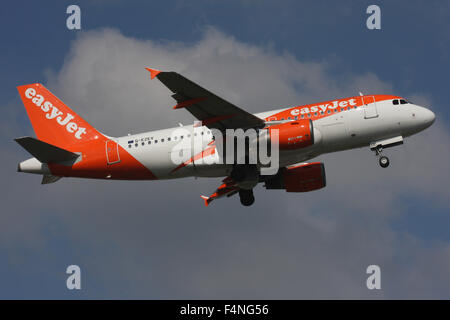 An easyJet Airbus A319 in new livery, and easyJet Airbus A320 in old ...