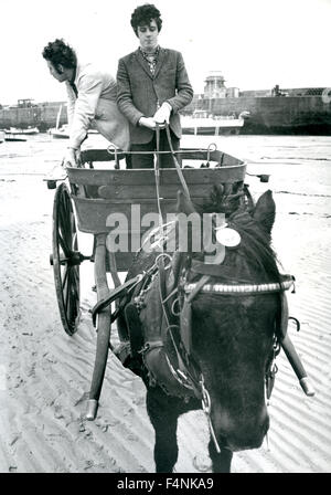 DONOVAN Scottish folk singer in 1965 with friend Gypsy Dave. Relaxing ...
