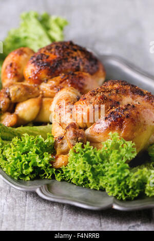 Whole Grilled mini chicken Stock Photo - Alamy