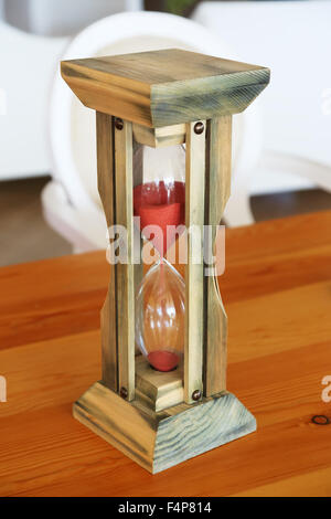 hourglass on the table, sand clock as time passing concept for business ...