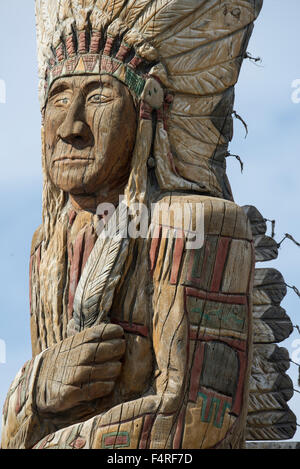 USA, Montana, Crow Agency. Crow chief, in full regalia wearing a war ...