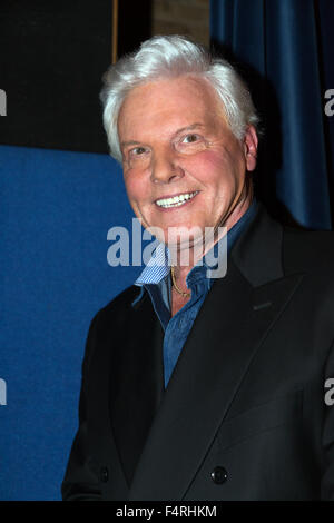Jess Conrad OBE, posing for a publicity picture at the Cinema Museum ...