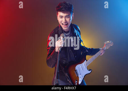 Young men singing in the bar Stock Photo - Alamy