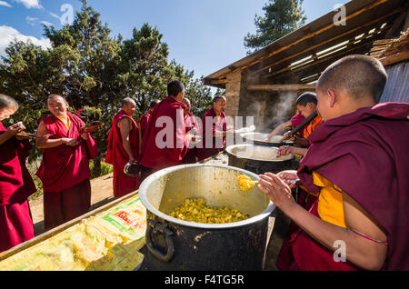 Buddhist monk queuing up for food alms, Amarapura Monastery, Mandalay ...