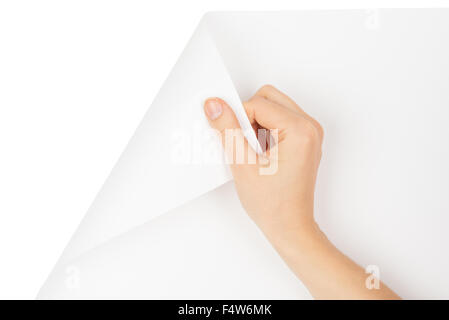 Humans hand turning upper empty page corner Stock Photo - Alamy