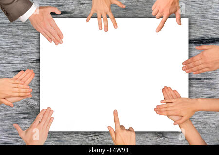 Male hands with blank sheet of paper, stationery and keyboard on color ...