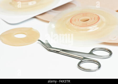 Ostomy supplies, colostomy bag, scissors and disk with scissors for ...