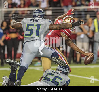 Seattle Seahawks' Bruce Irvin (51) prepares to block Kyle Knox, center ...