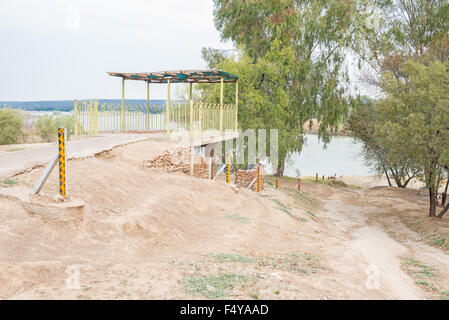 The confluence of the Vaal and Orange Rivers at the town of Douglas in ...