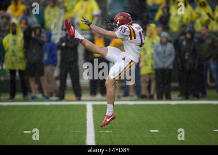 Iowa State punter Colin Downing (13) kicks against Memphis in the first ...