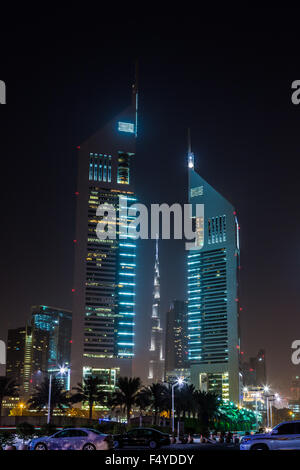 DUBAI - APRIL 18: Emirates Towers and Burj Khalifa at night time, 18 ...