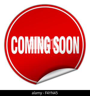 coming soon round red sticker on white background Stock Photo - Alamy