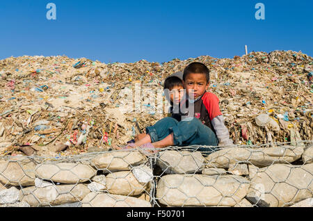Children live, play and work on the garbage dump at Bhagmati River in ...