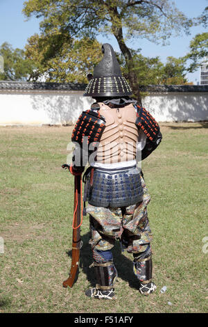 Japanese samurai with fire lock rifle Stock Photo - Alamy