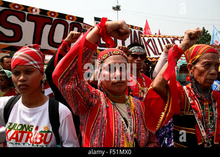 Philippines. 26th Oct, 2015. Members of Lumad tribe raise their fist in ...