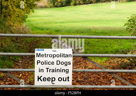 Warning Police Dogs in Training sign, UK Stock Photo - Alamy