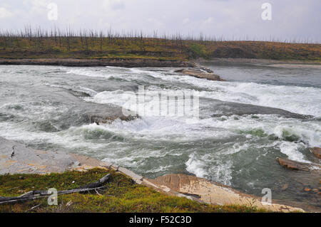 Rapids on the Putorana plateau. Rocks and jets of water Oron rapids on ...
