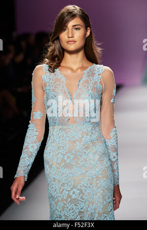 A model walking the runway during CANADA 150 Fashion show on day three ...